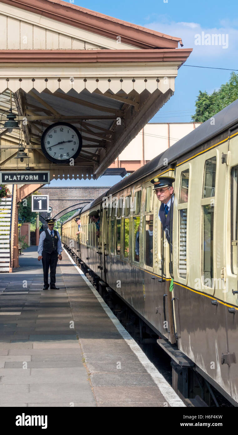 Station Master and Guard at Toddington railway station, Gloucestershire ...