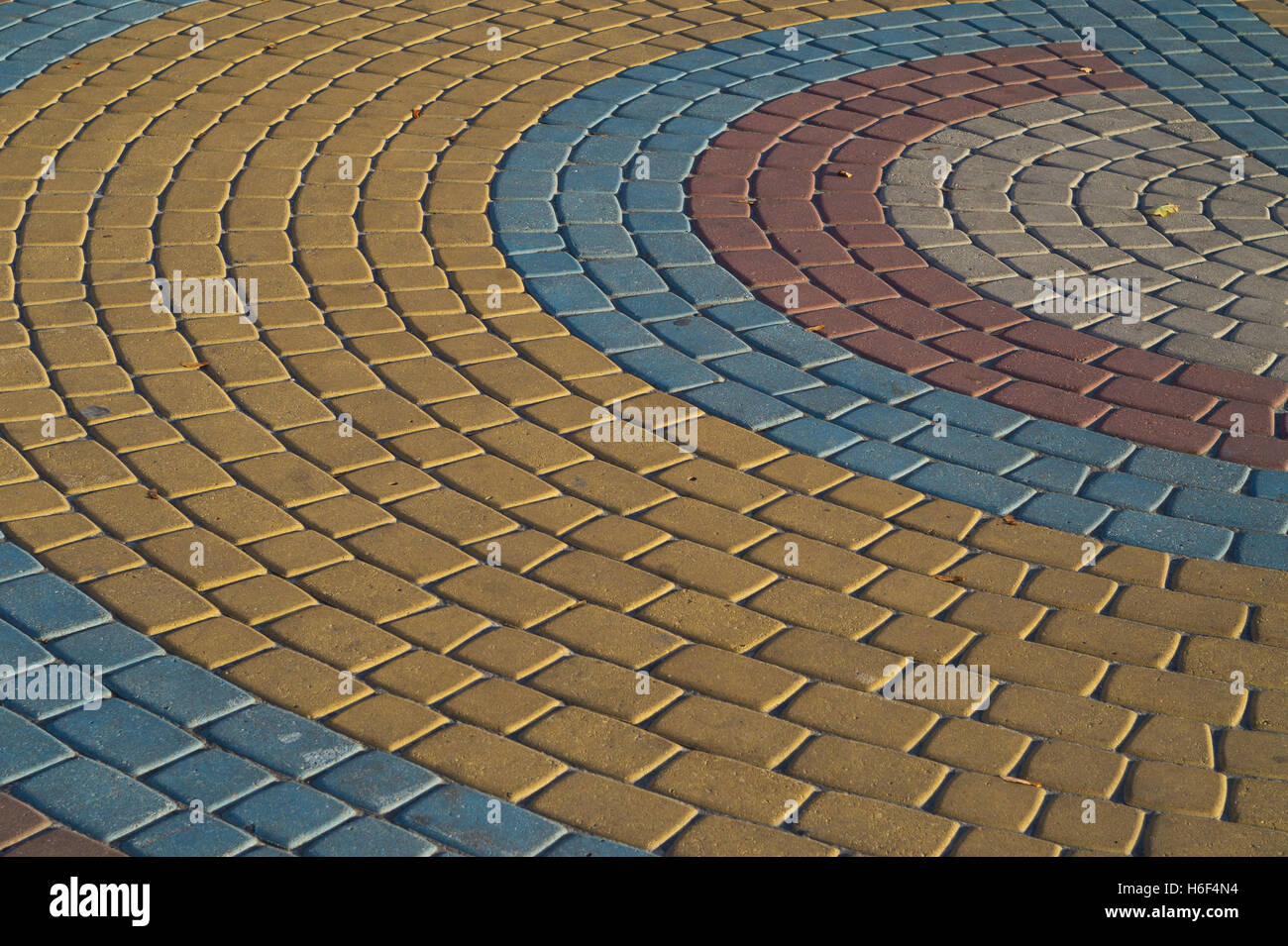 color patterns are paved a sidewalk tile Stock Photo - Alamy