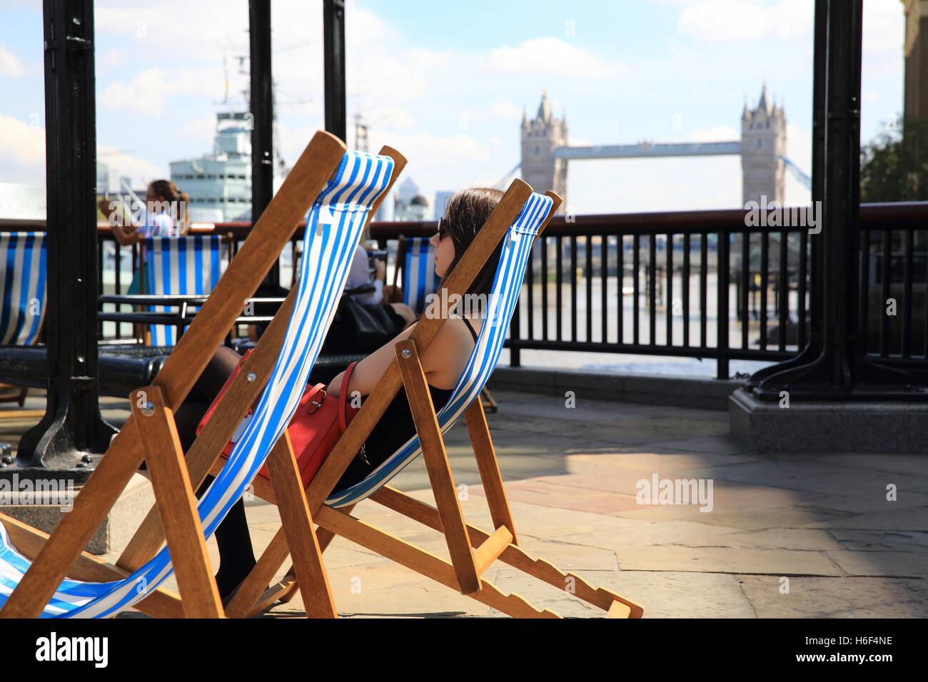Girl sunbathing on the chairs hi-res stock photography and images - Alamy