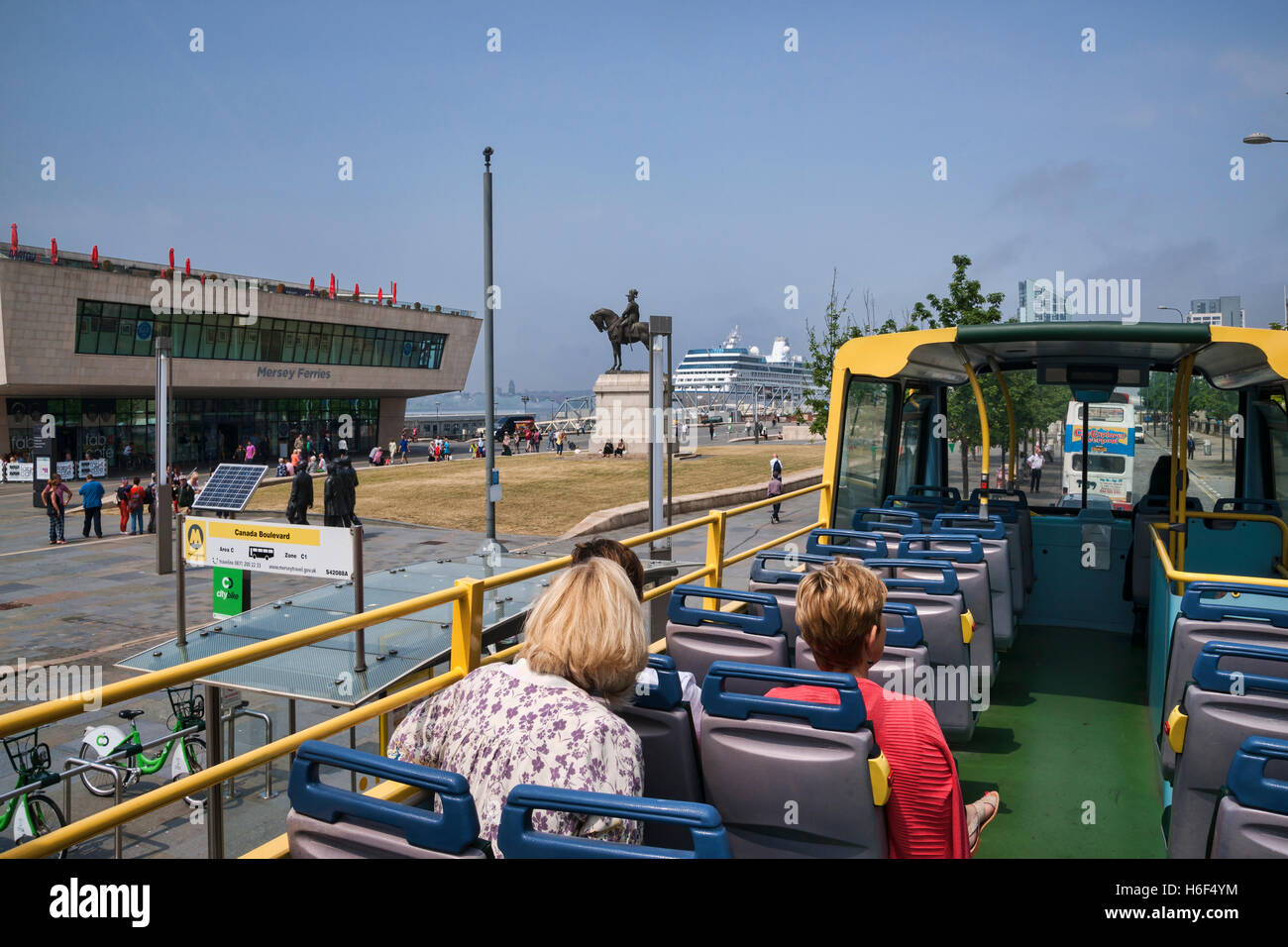 Promenade and cruise ship from city tour bus, Liverpool, Merseyside ...