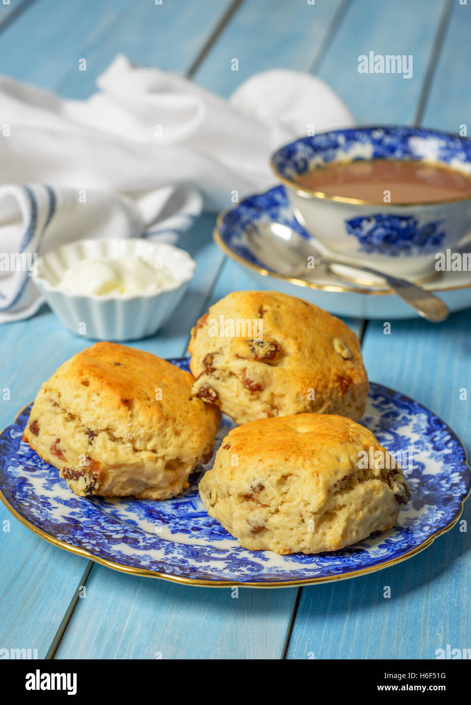 Vintage tea plate full of freshly baked scones Stock Photo - Alamy