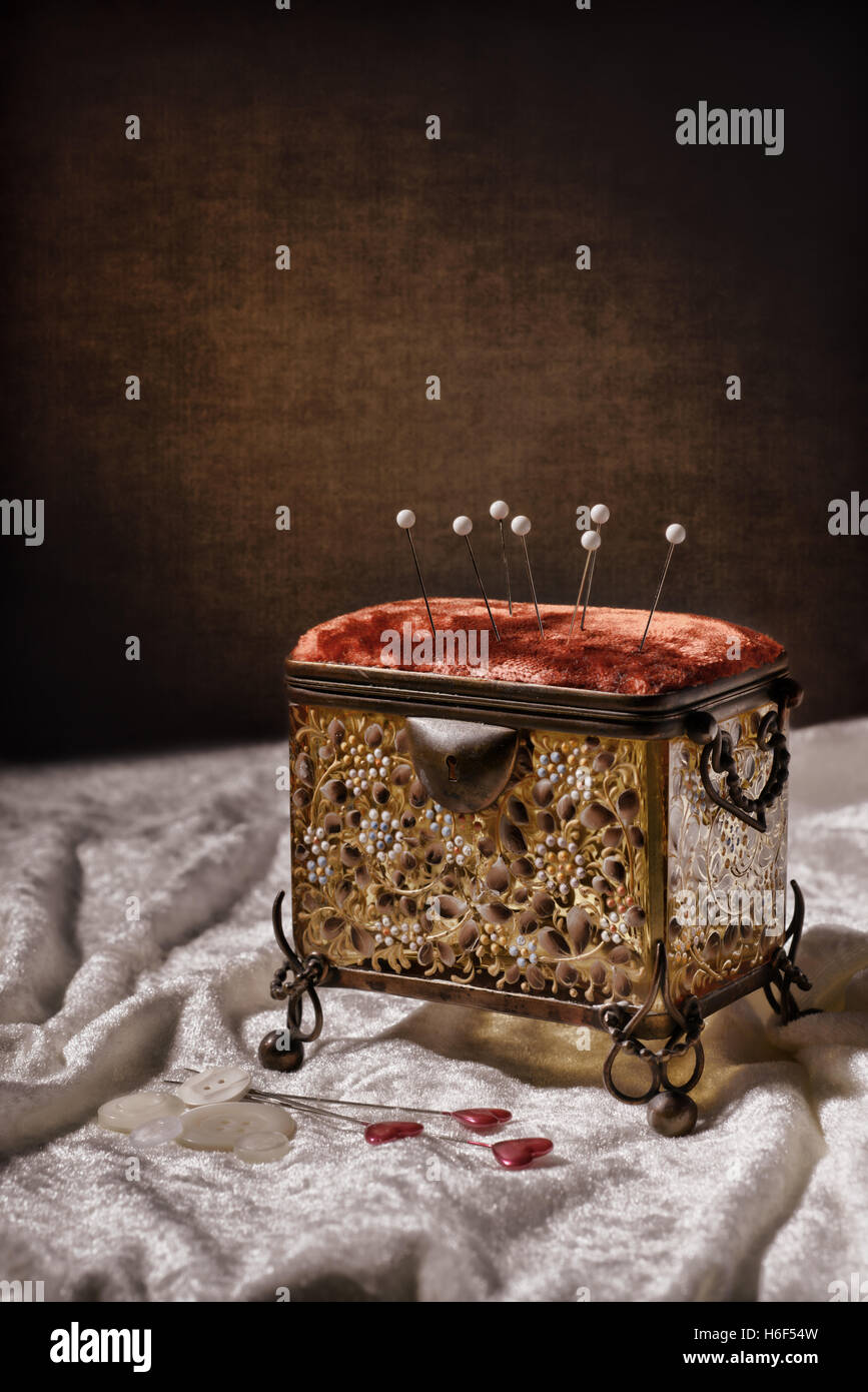 Antique sewing box with buttons and pins Stock Photo - Alamy