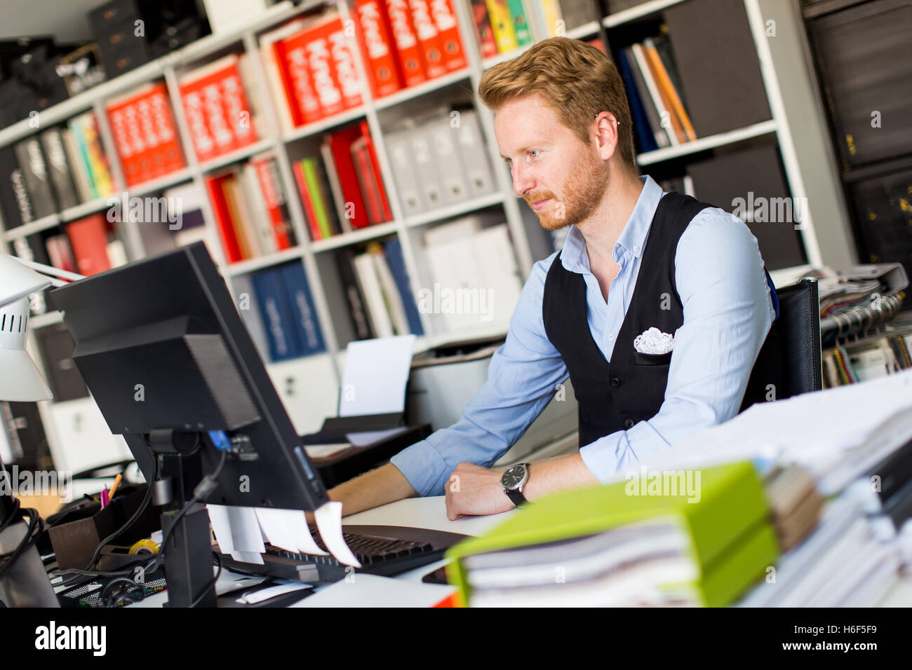 Man working in an office man working in an office hi-res stock ...