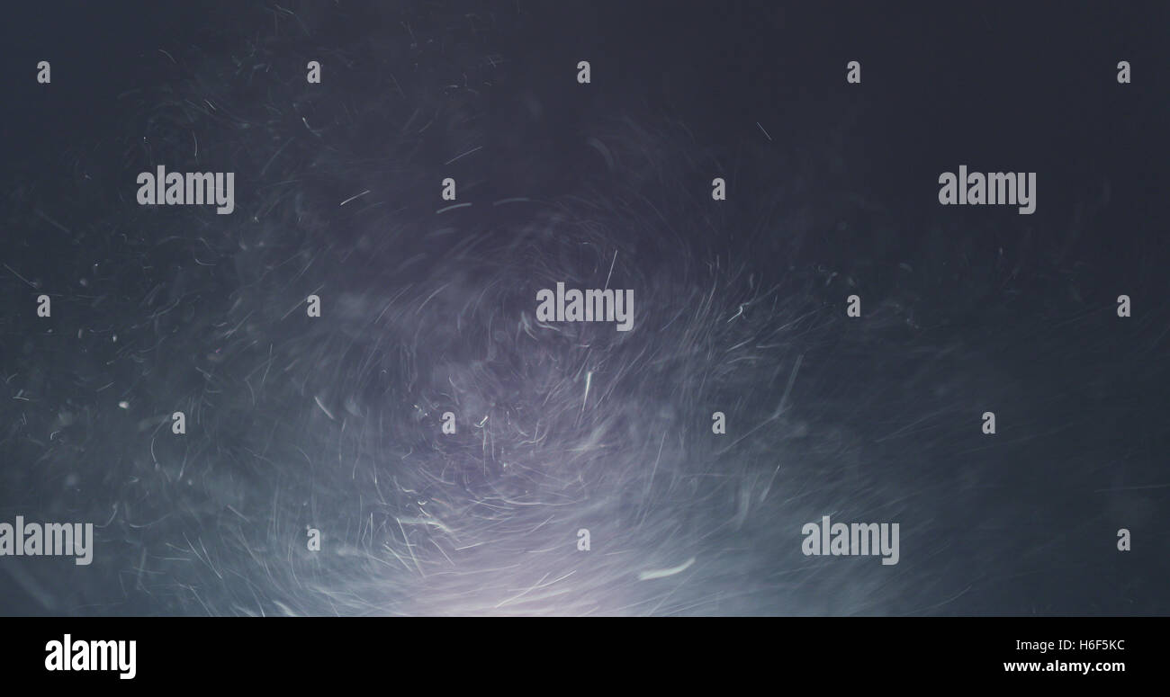 abstract dust particles fast moving over black background Stock Photo ...