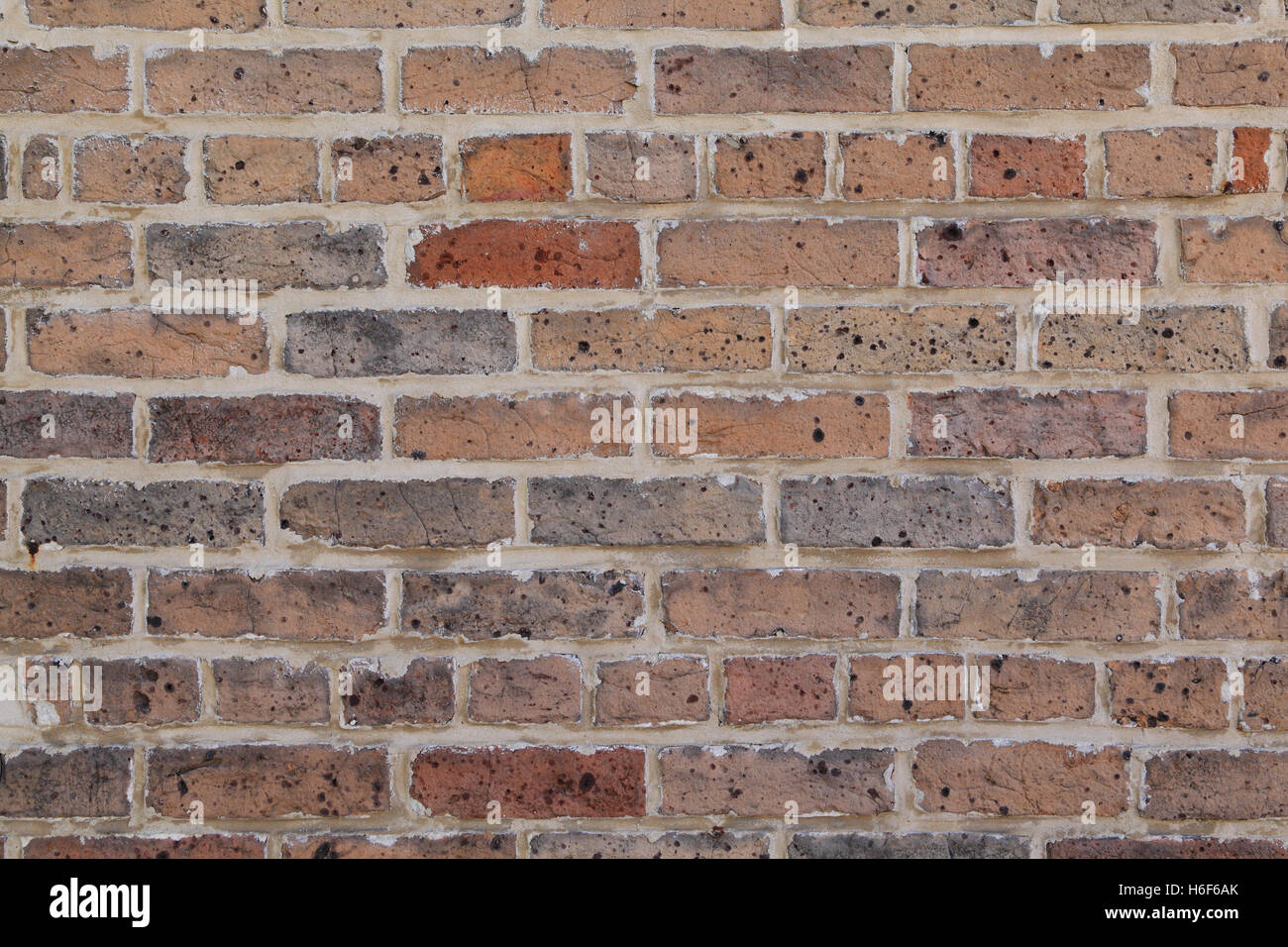 Unpainted brick wall forms a pattern that can be used for backgrounds ...