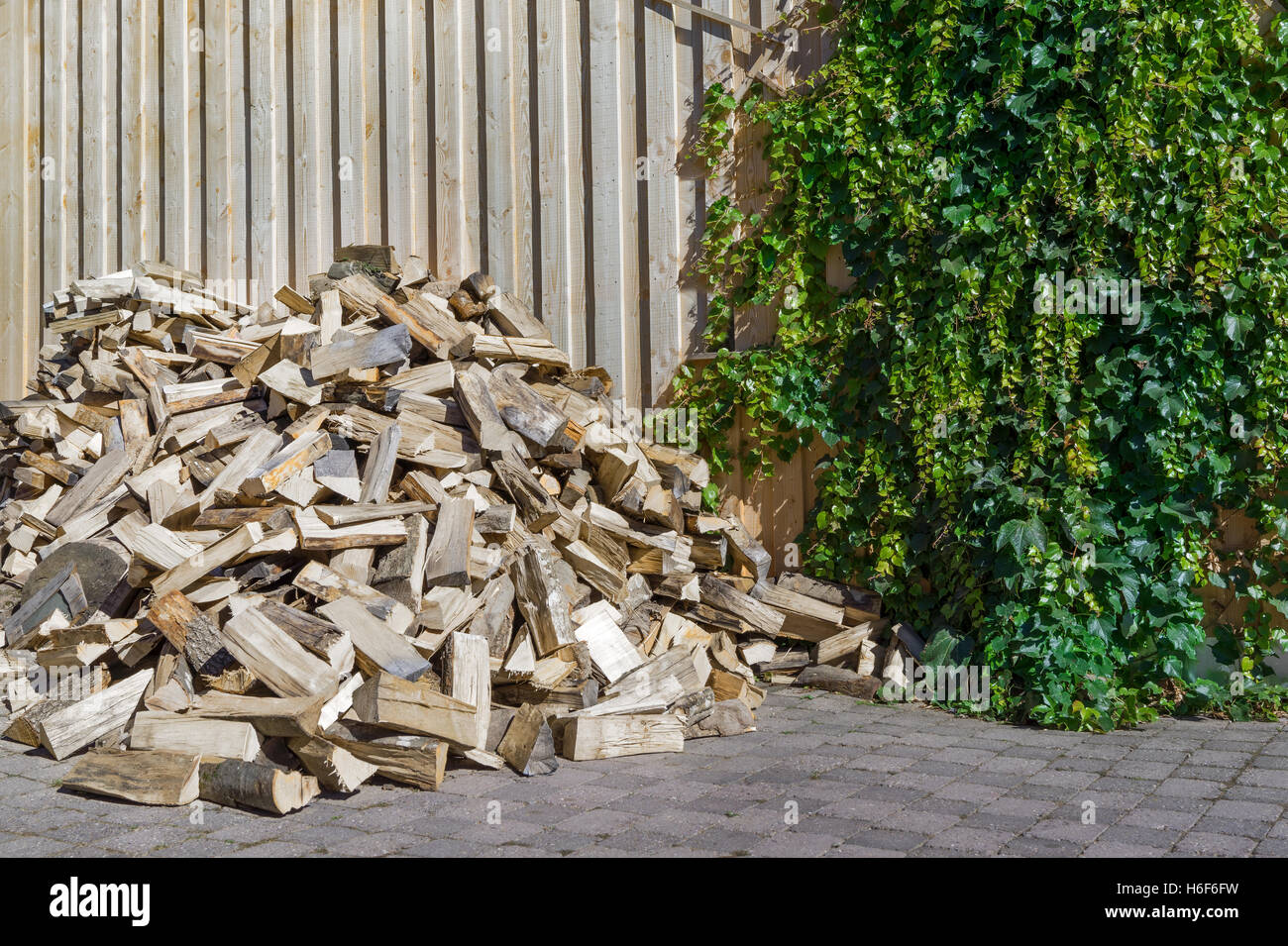 Heap of firewood Stock Photo - Alamy