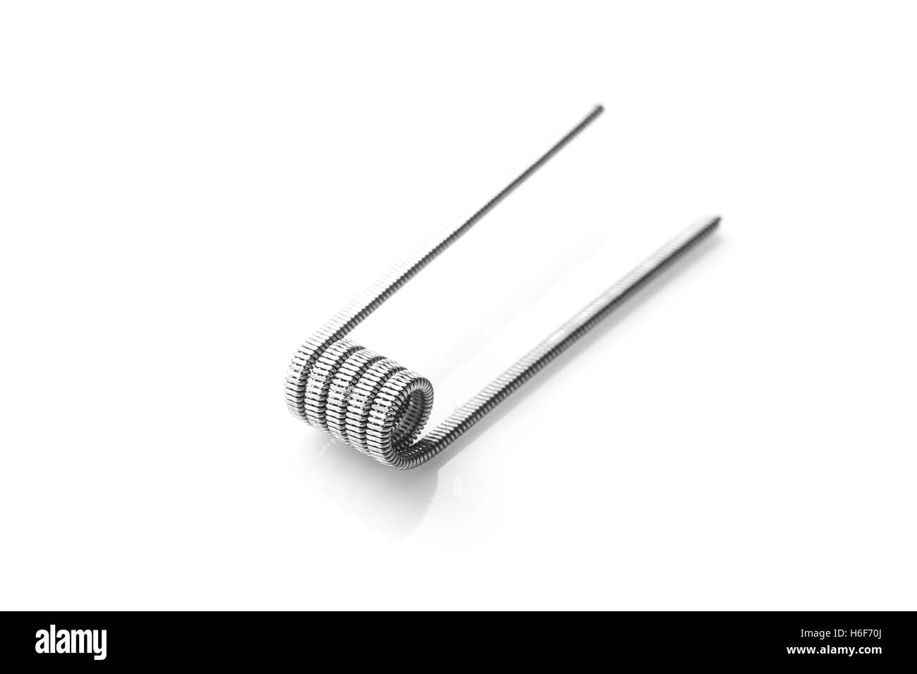 Fused clapton coil for vaping on a white background macro closeup wire ...
