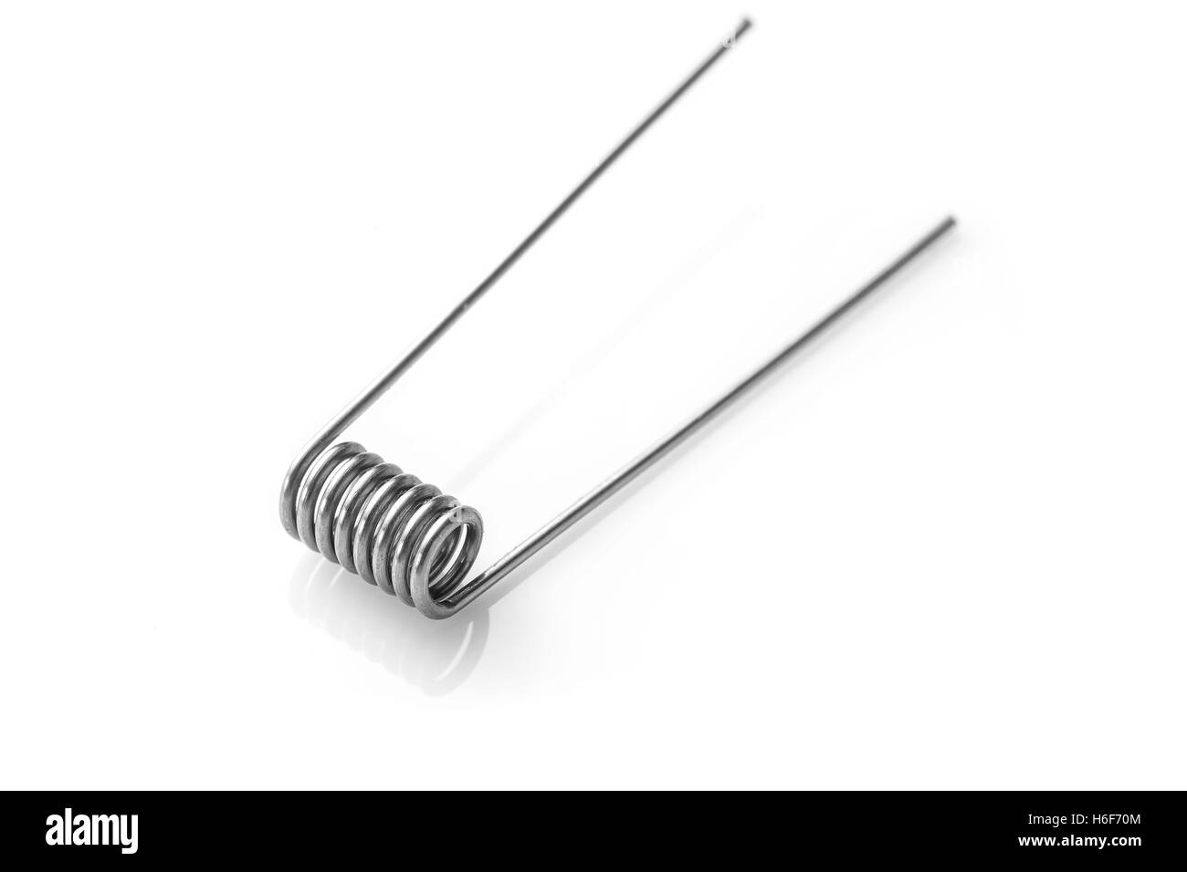 stainless coil for vaping on a white background macro closeup wire ...