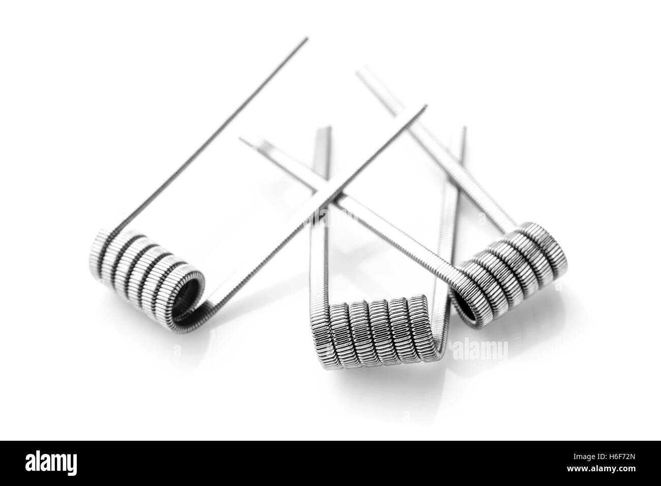Tank track coils for vaping on a white background macro closeup wire ...