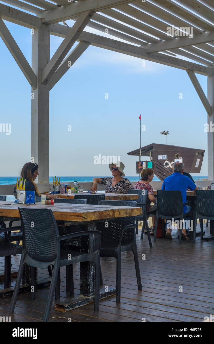 HAIFA, ISRAEL - OCTOBER 27, 2016: Beach promenade scene with workers ...