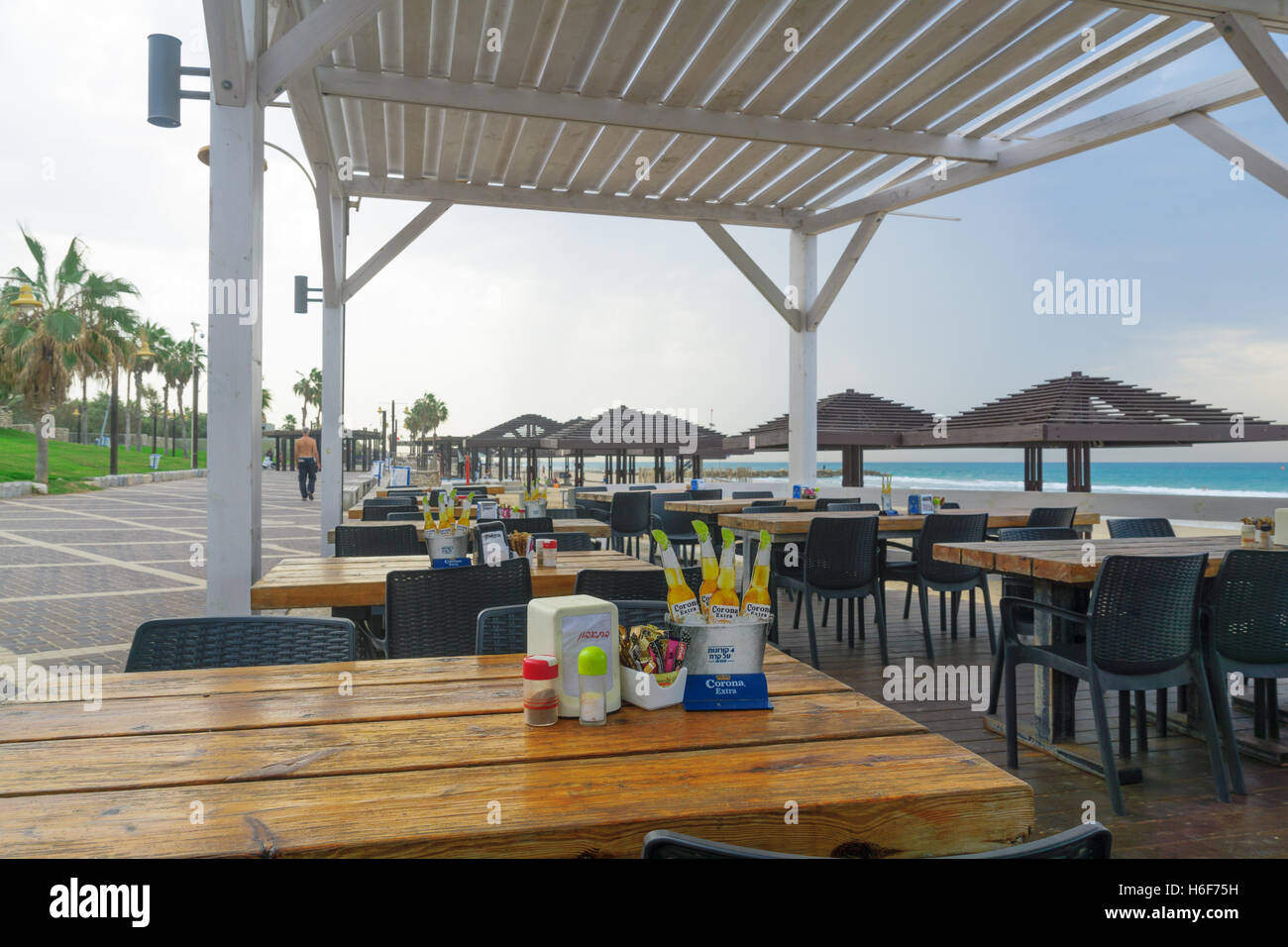 HAIFA, ISRAEL - OCTOBER 27, 2016: Beach promenade scene with workers ...