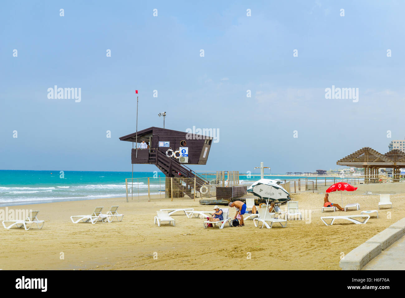 HAIFA, ISRAEL - OCTOBER 27, 2016: Beach promenade scene with workers ...
