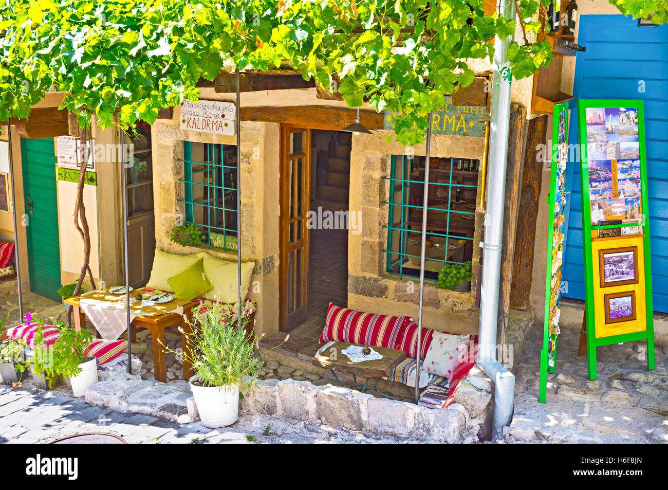The tiny cafe with the nice terrace for the pleasant dinner Stock Photo ...