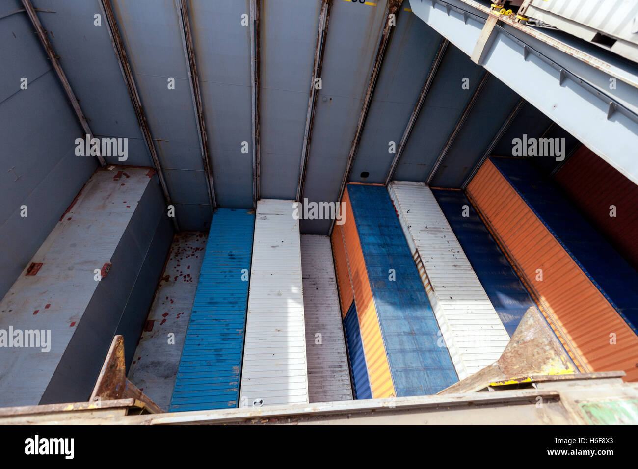 View of a freighter ship's storage compartment, half full with ...