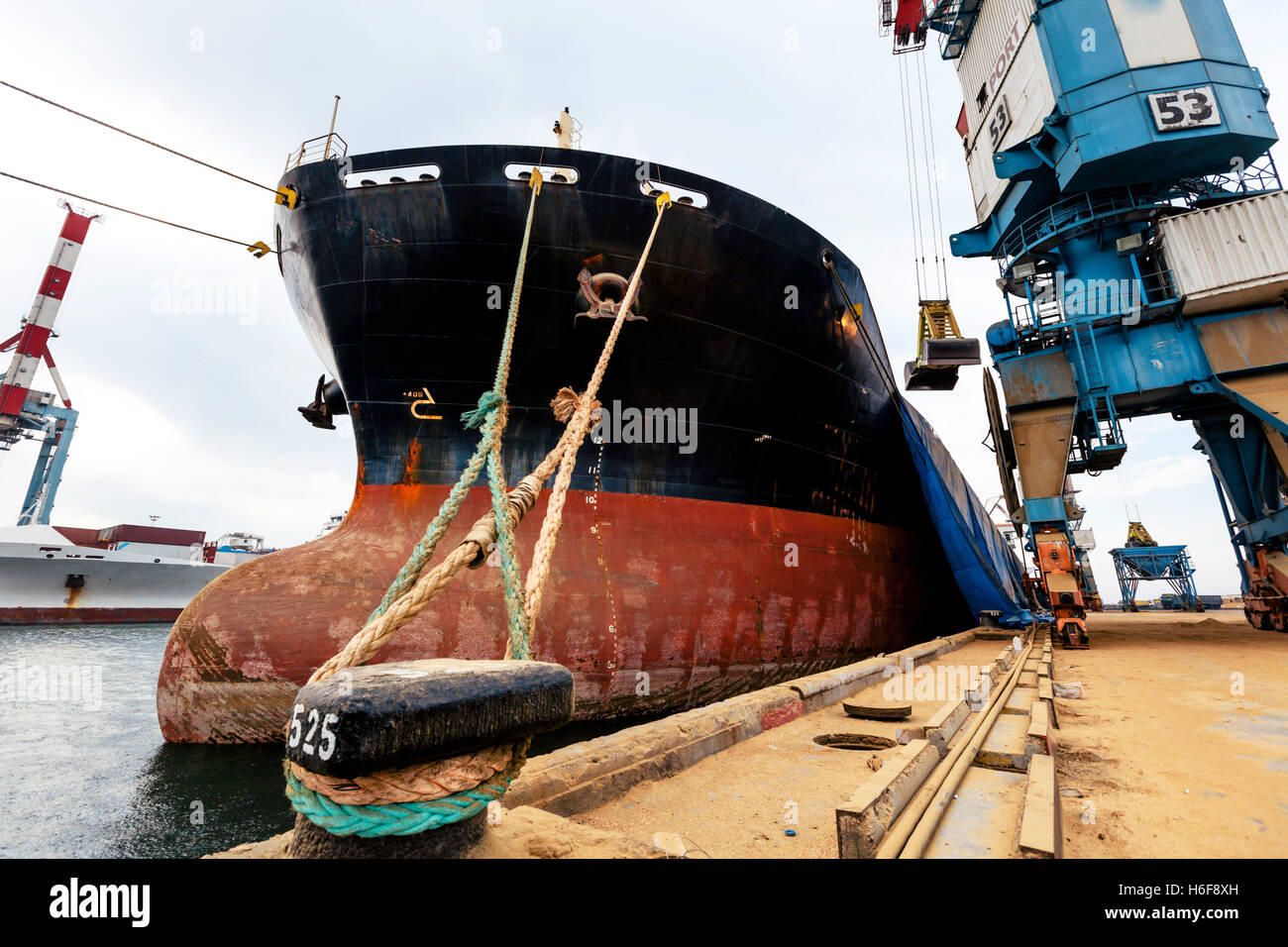 A grain freighter ship docking in a commercial port Stock Photo - Alamy