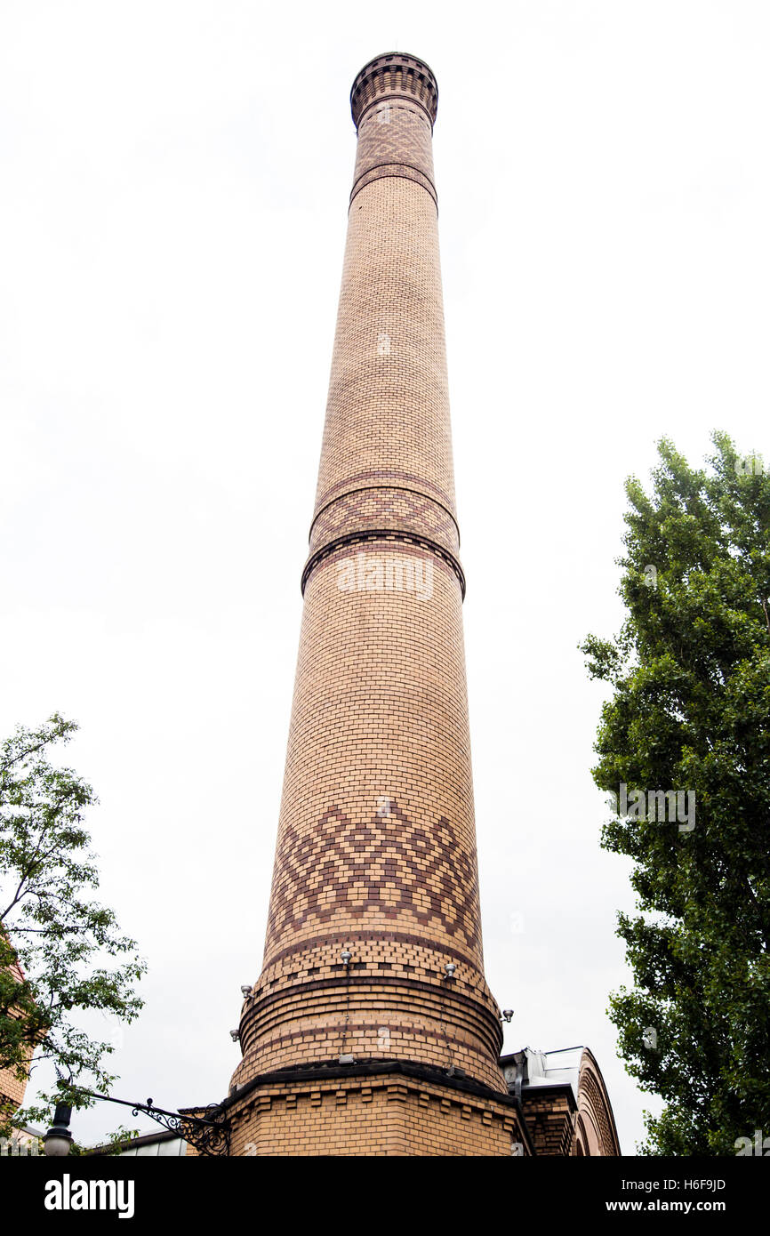 Tall industrial chimney Stock Photo - Alamy