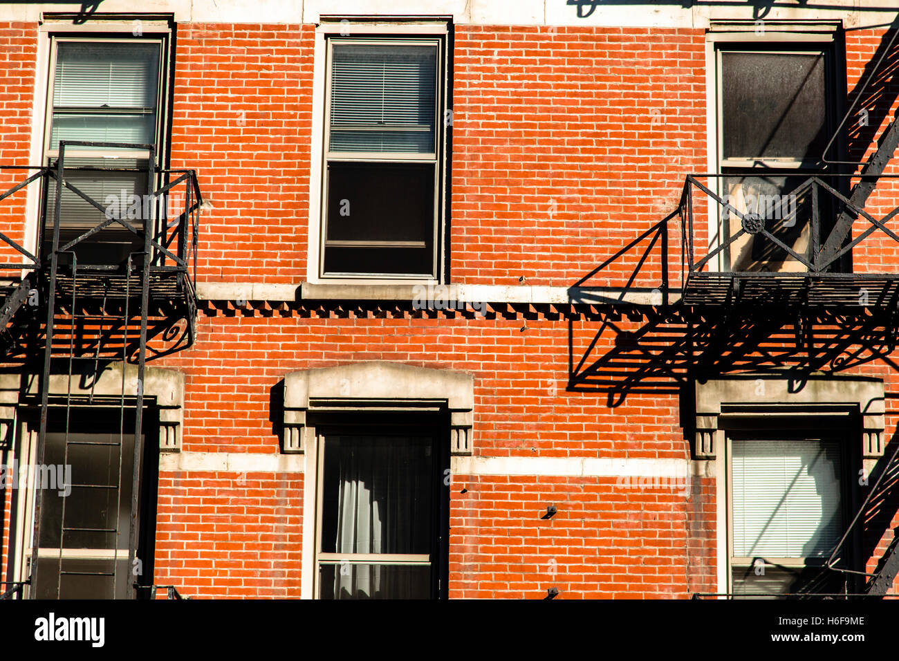 The exterior of a red stone residential building in Manhattan Stock ...