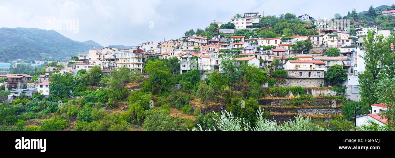 The picturesque Agros village on the slope of the Troodos, surrounded ...