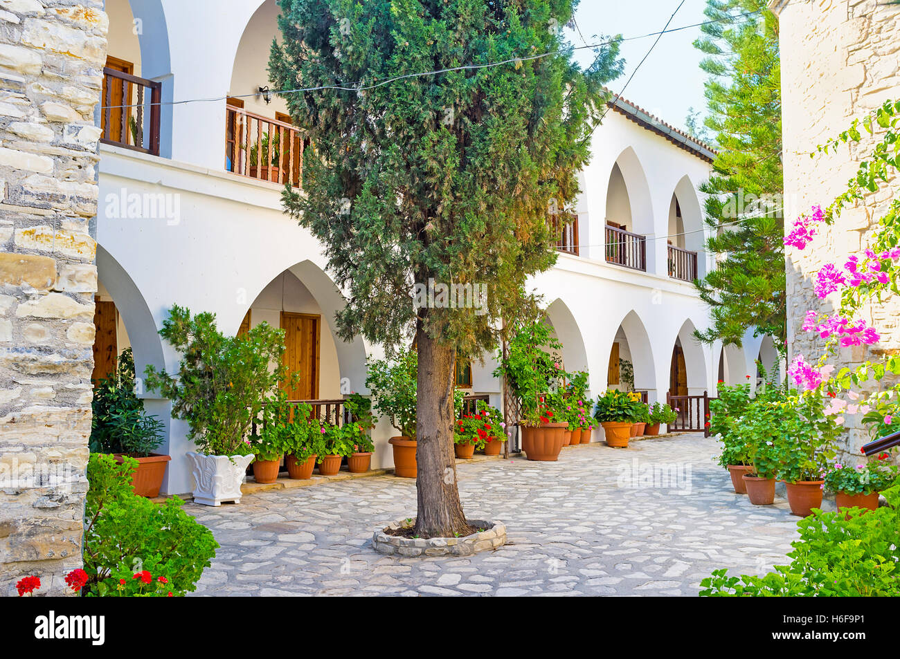 The shady white terraces of St Minas Monastery in Vavla, Cyprus Stock ...
