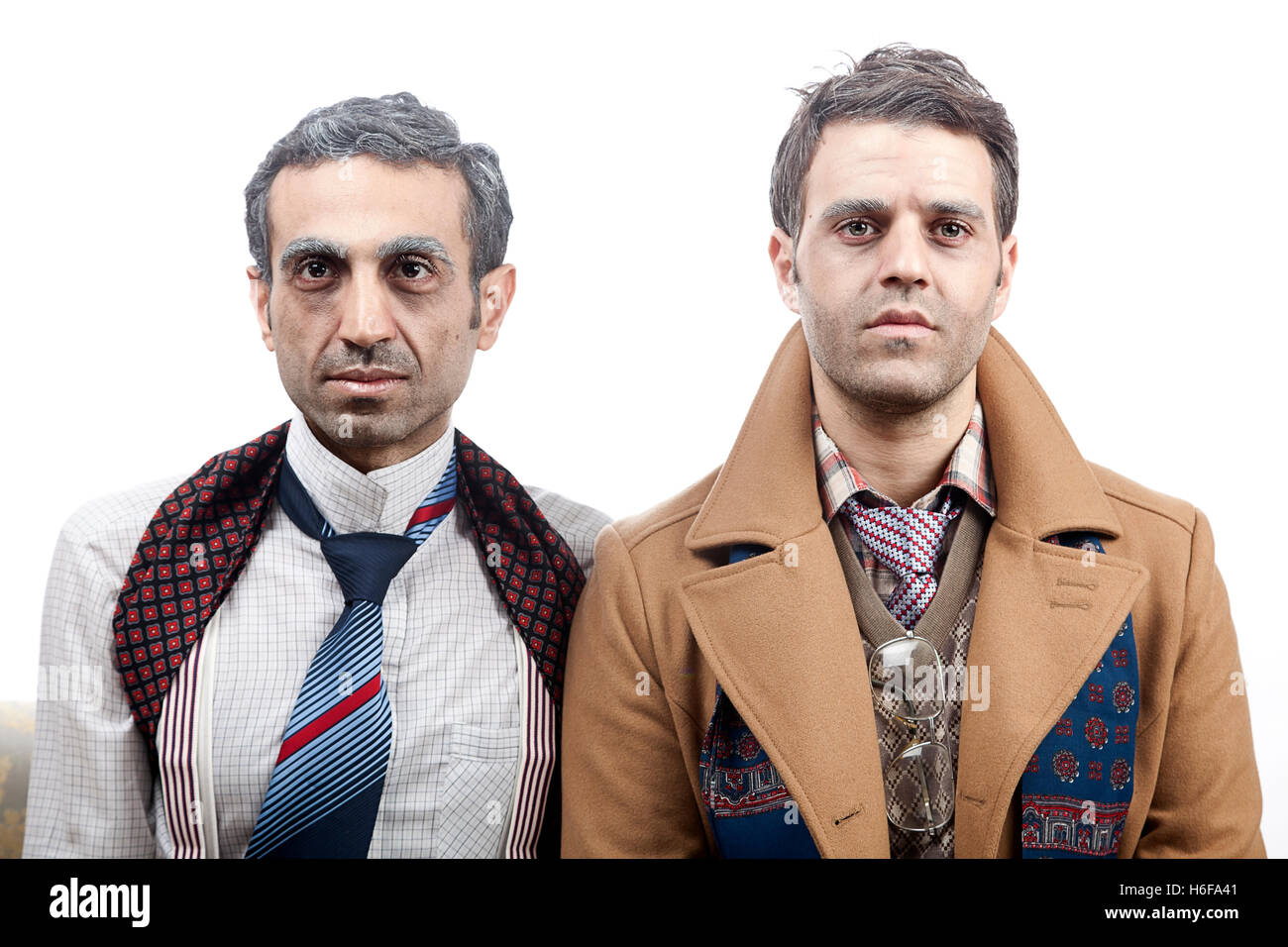 Two adult man (mid 30's and mid 20's) wearing old-man clothes and ...