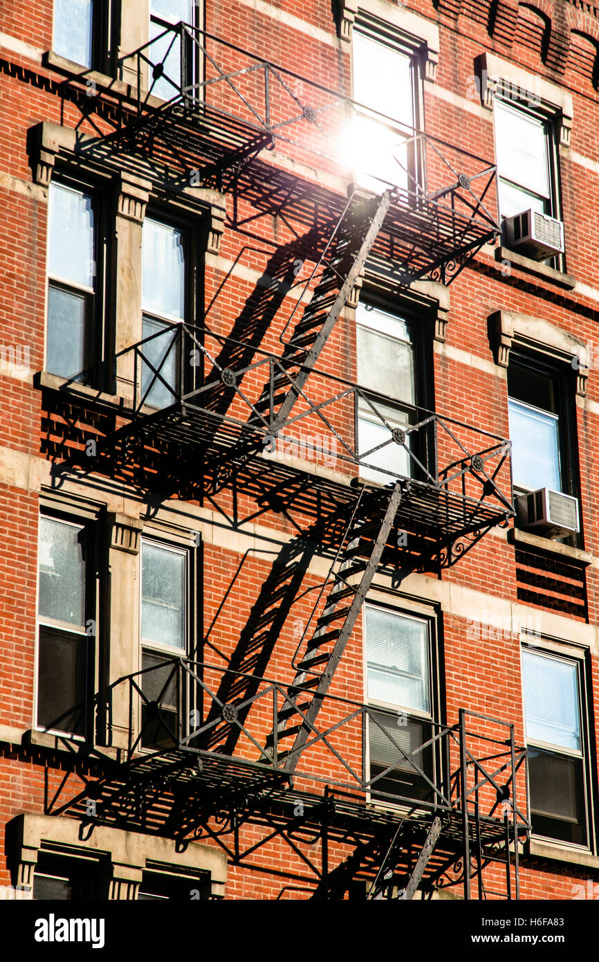 The exterior of a red stone residential building in Manhattan Stock ...