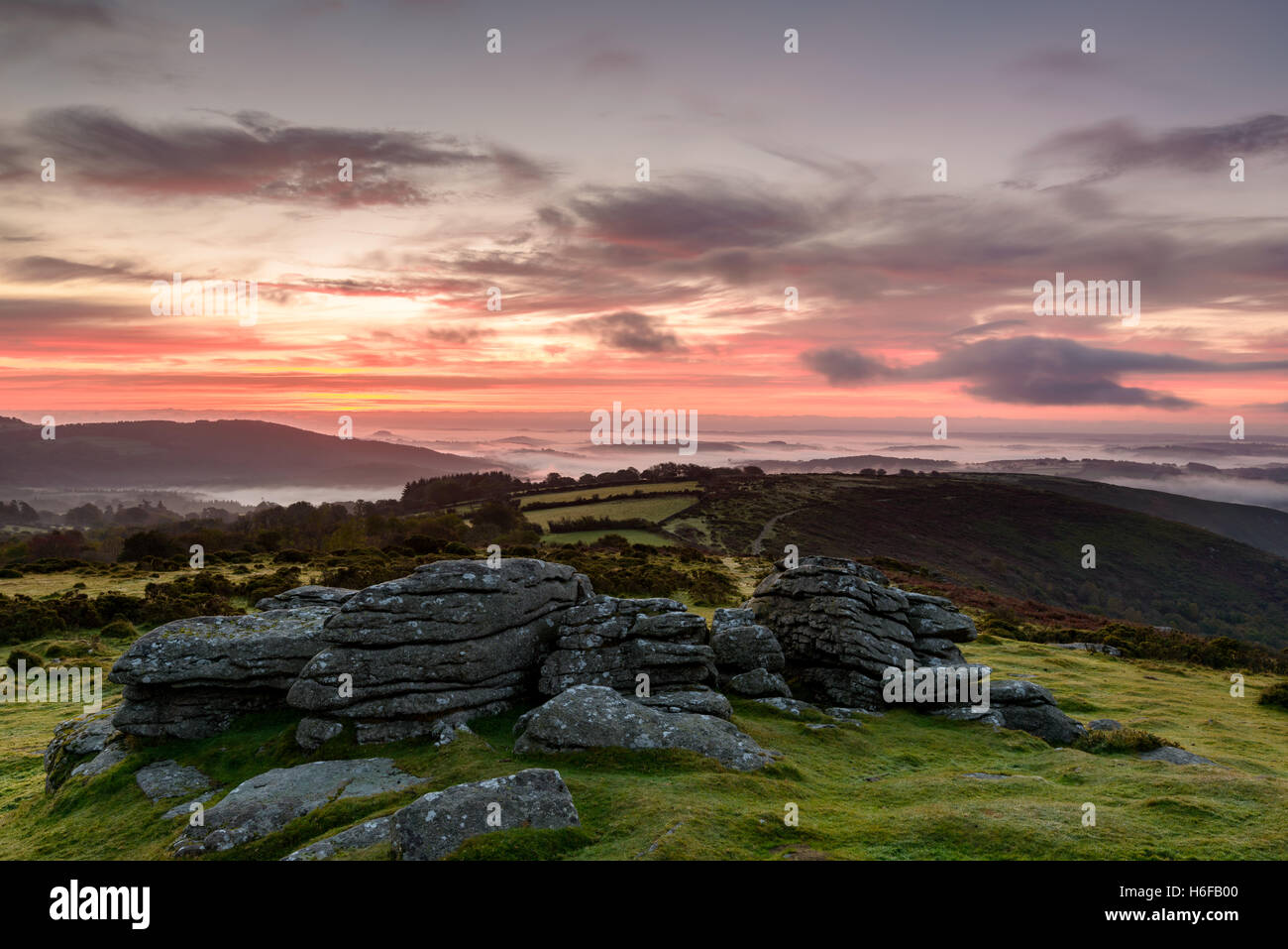 Morning sky and mist over Holne Chase from Mel Tor, Dartmoor, UK Stock ...