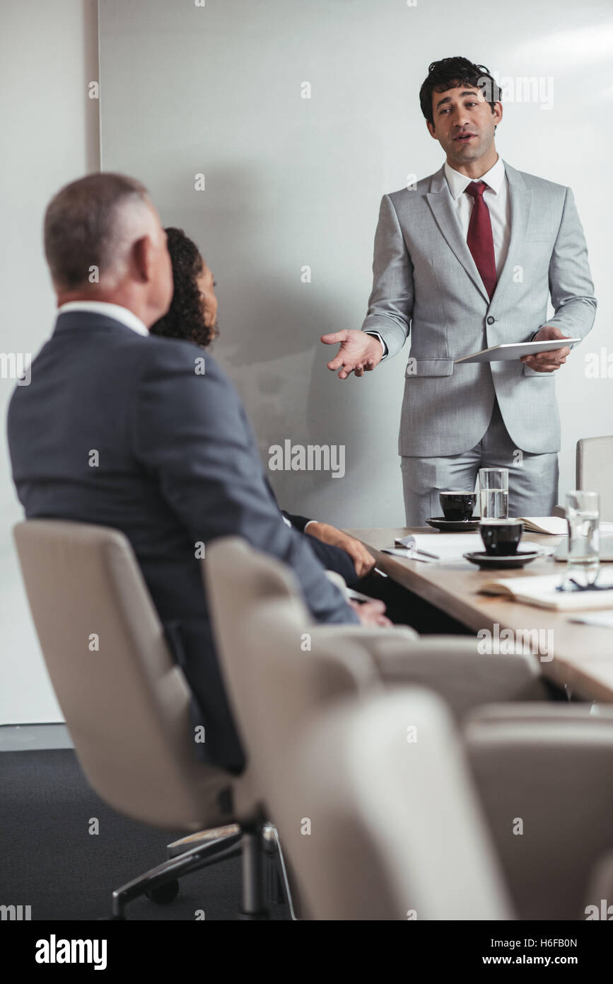 Manager explaining business strategy colleagues hi-res stock ...