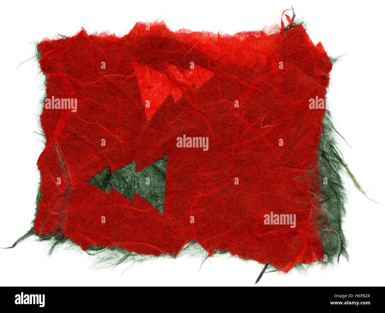 Texture of dark red rice paper with a pattern of green pine trees ...