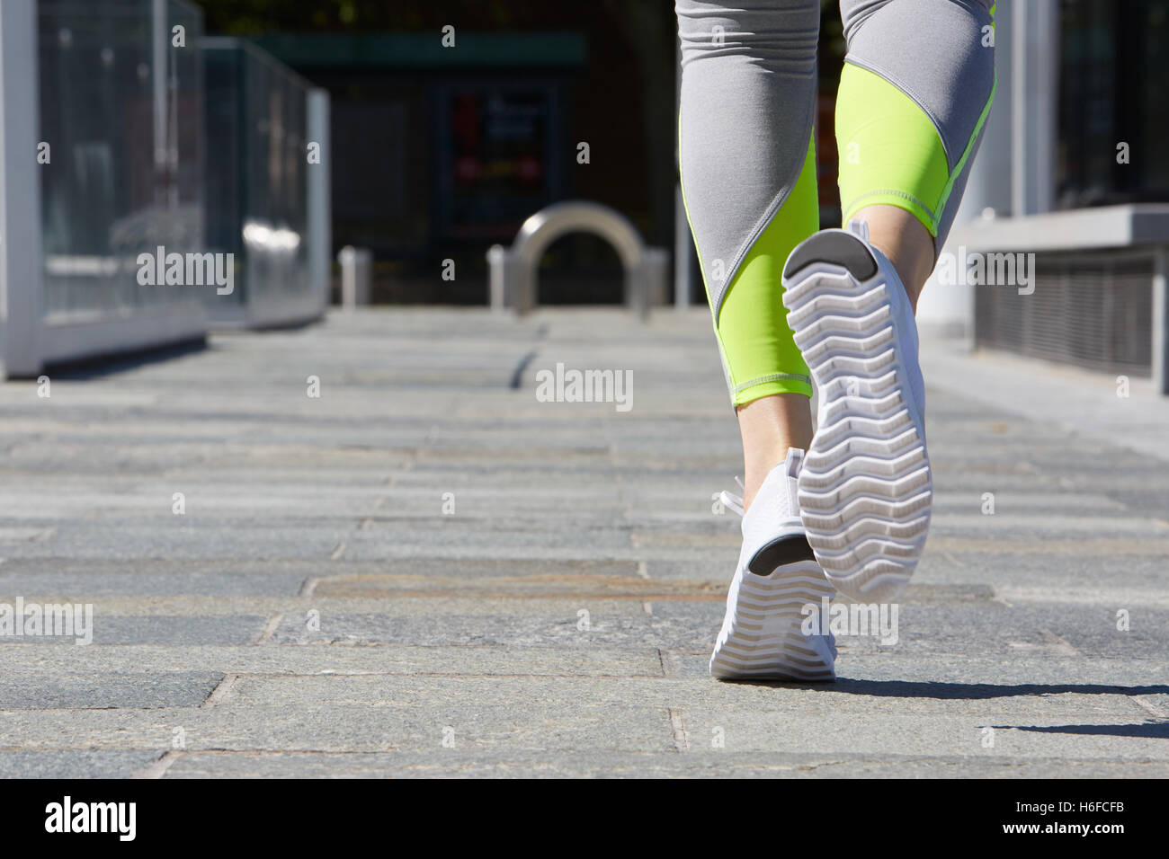 Woman running park legs hi-res stock photography and images - Alamy