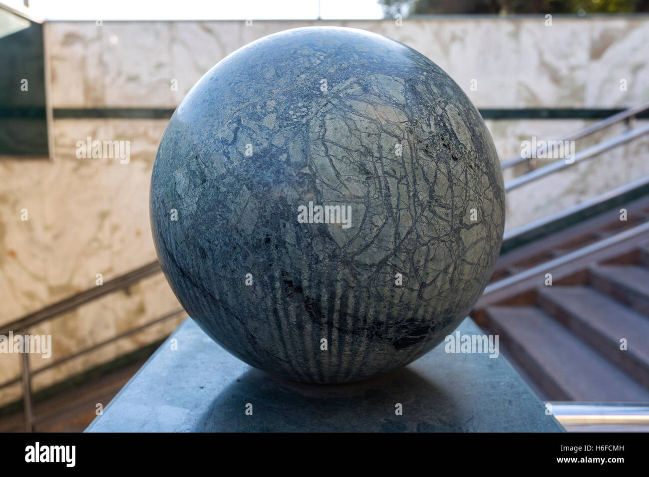 The stone ball on stairs Stock Photo - Alamy