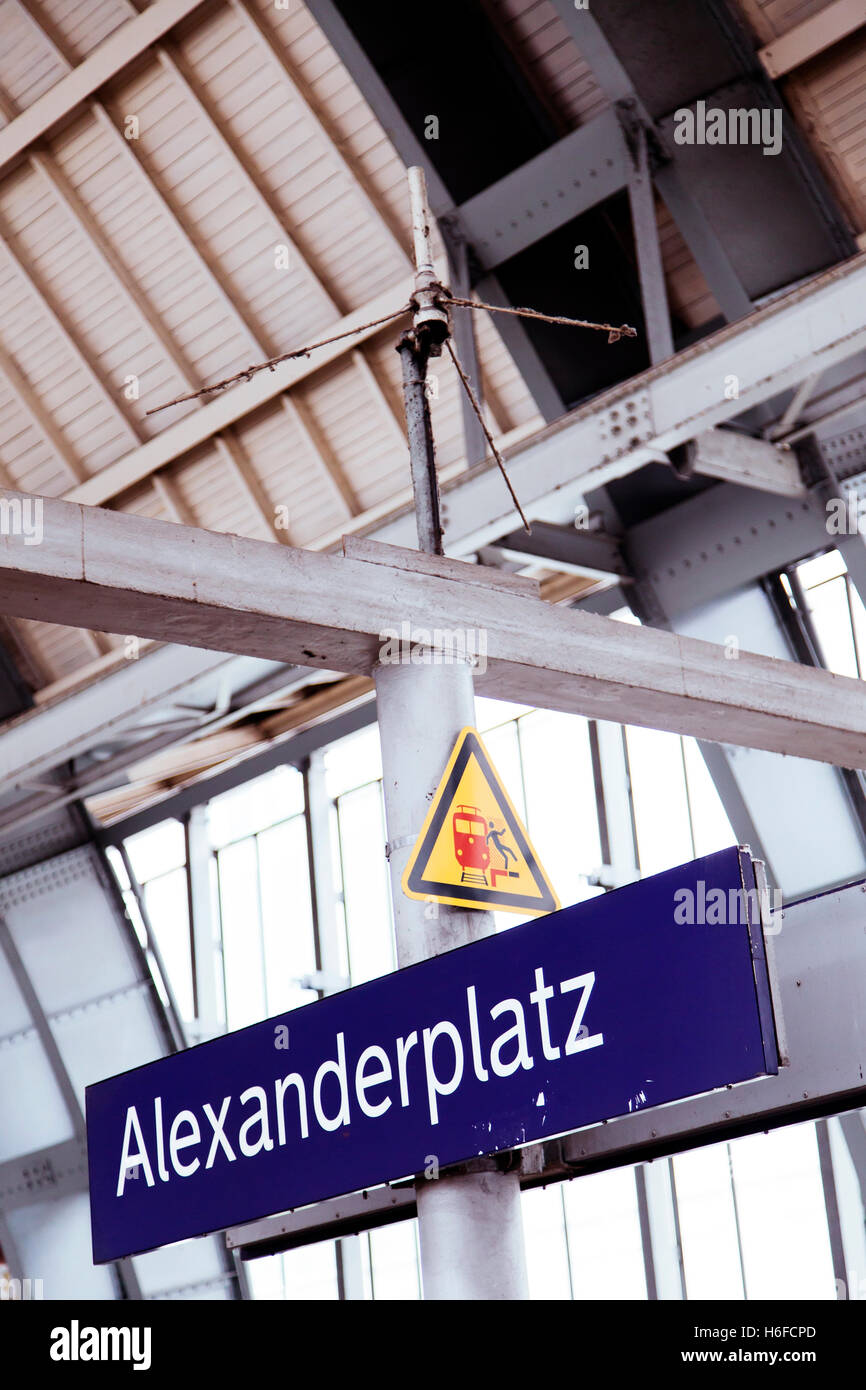 Train station sign depicting it is the Alexanderplatz station in Berlin ...