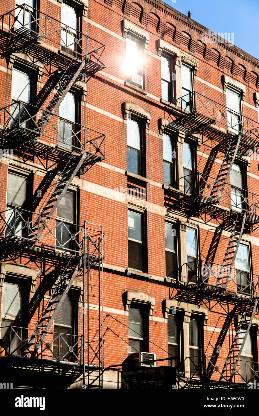 The exterior of a red stone residential building in Manhattan Stock ...
