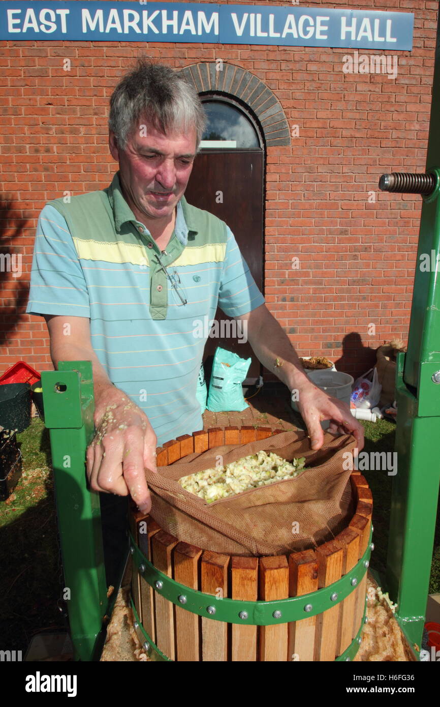 Apple pressing for juice outside East Markham Village Hall on this ...