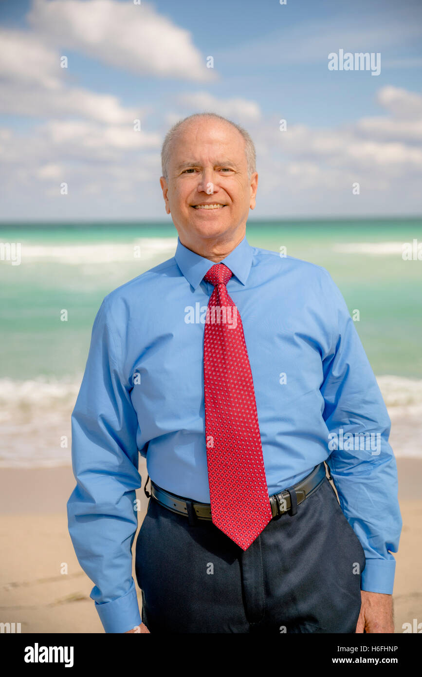 A businessman at the beach in Miami Beach, Florida Stock Photo - Alamy