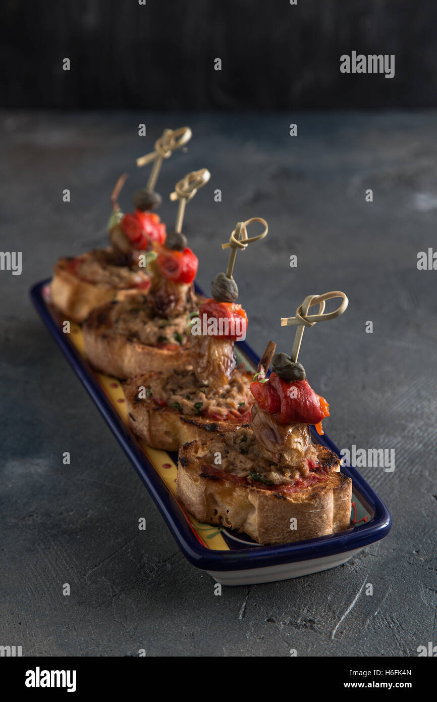 Tuna Tapenade on Lightly Toasted Baguette with pepper, onion and capers ...