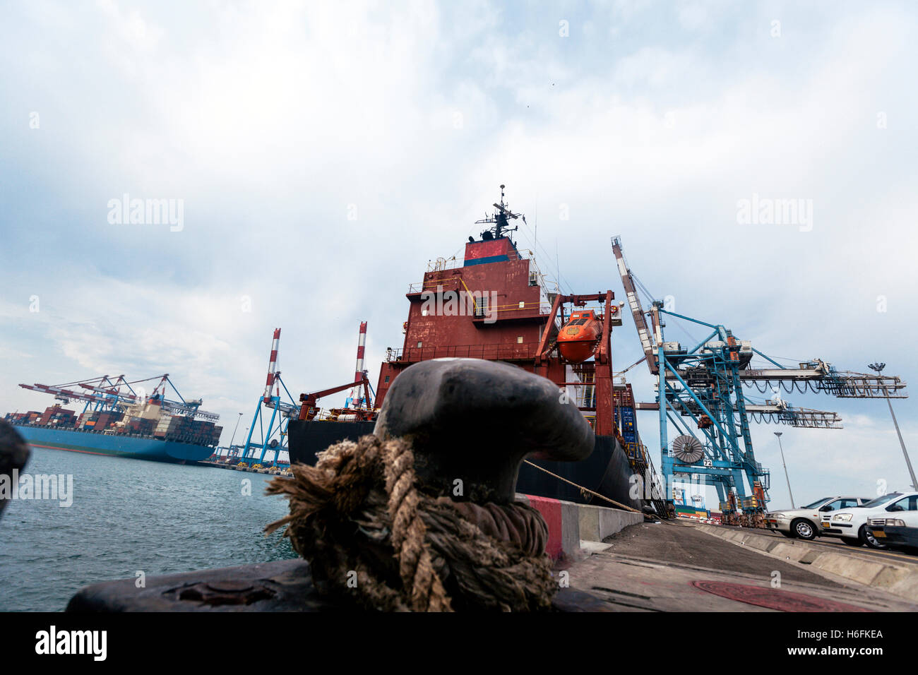 Docking freighter ships in a commercial harbor Stock Photo - Alamy