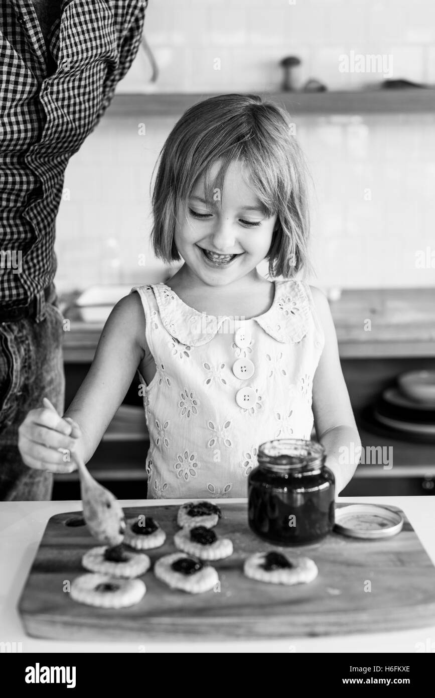 Little Girl Making Pastry Stock Photo - Alamy