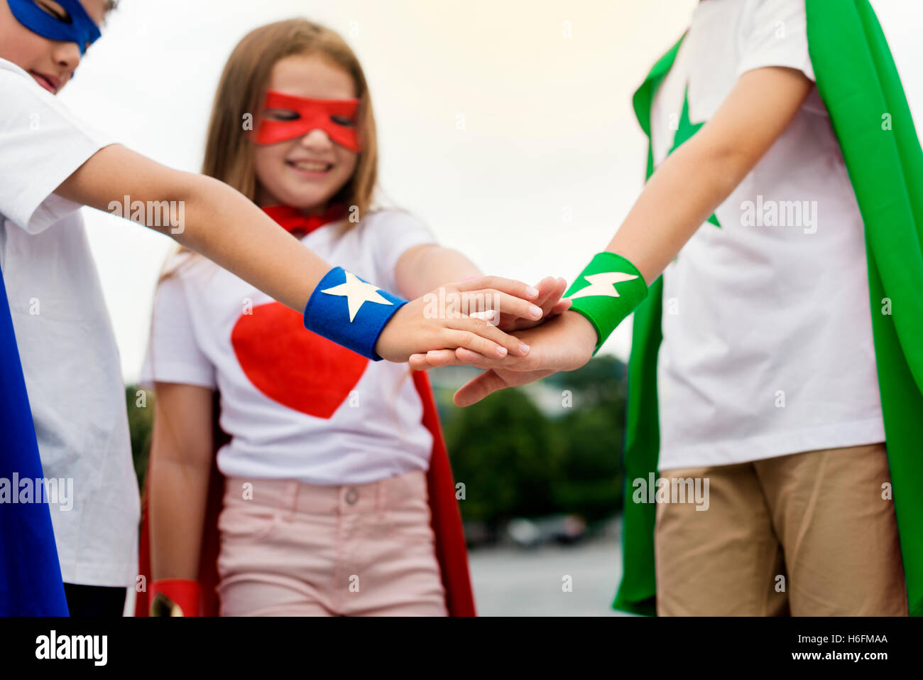 Superhero Boy Girl Brave Imagination Teamwork Concept Stock Photo - Alamy