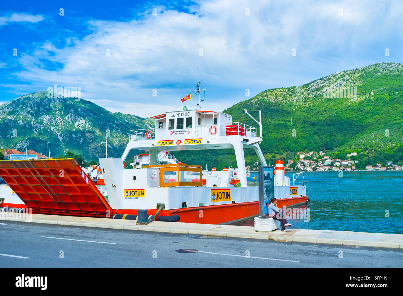 The ferry across Verige Strait in Bay of Kotor waits for the passengers ...