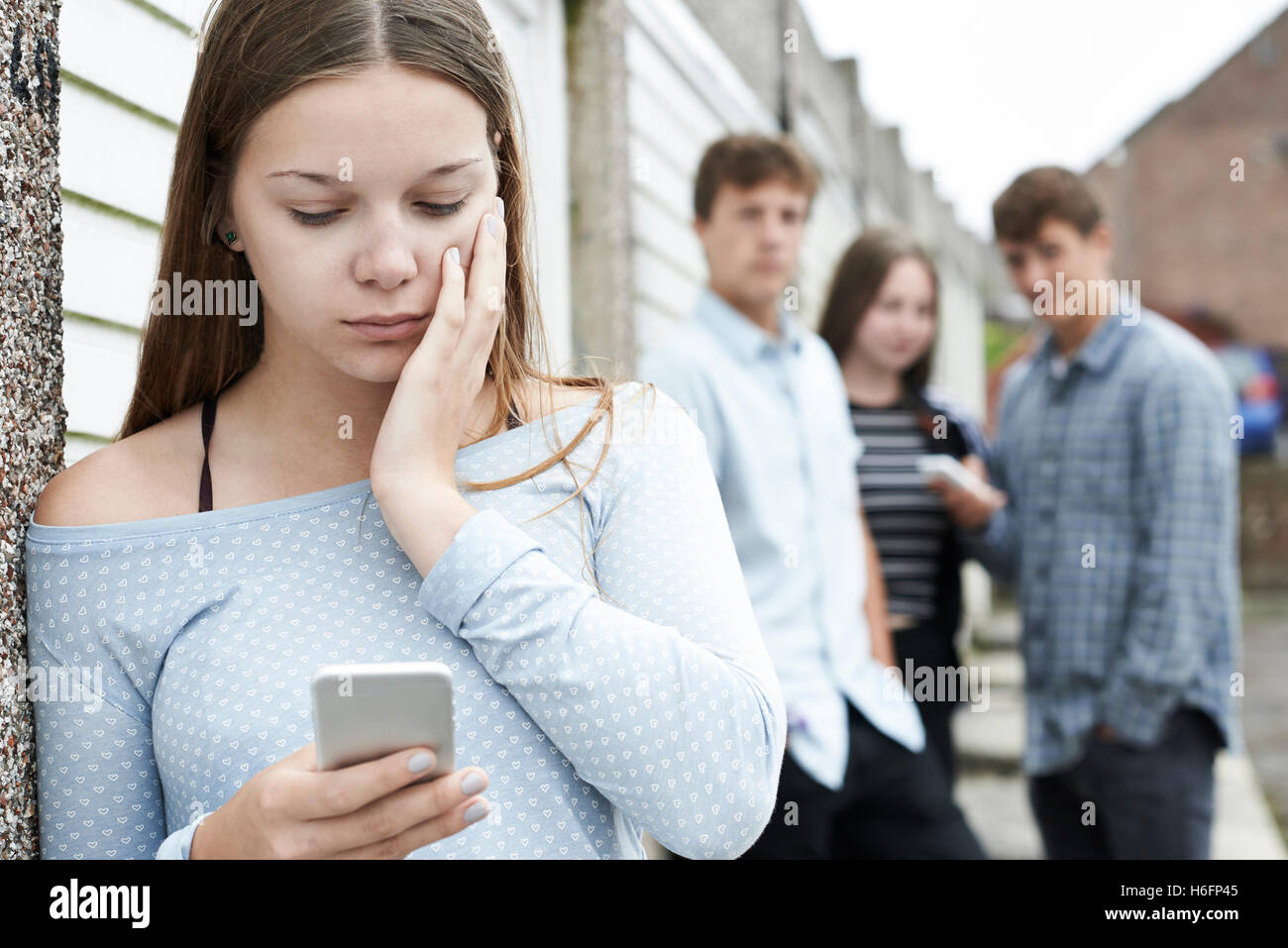 Girl bullying phone hi-res stock photography and images - Alamy
