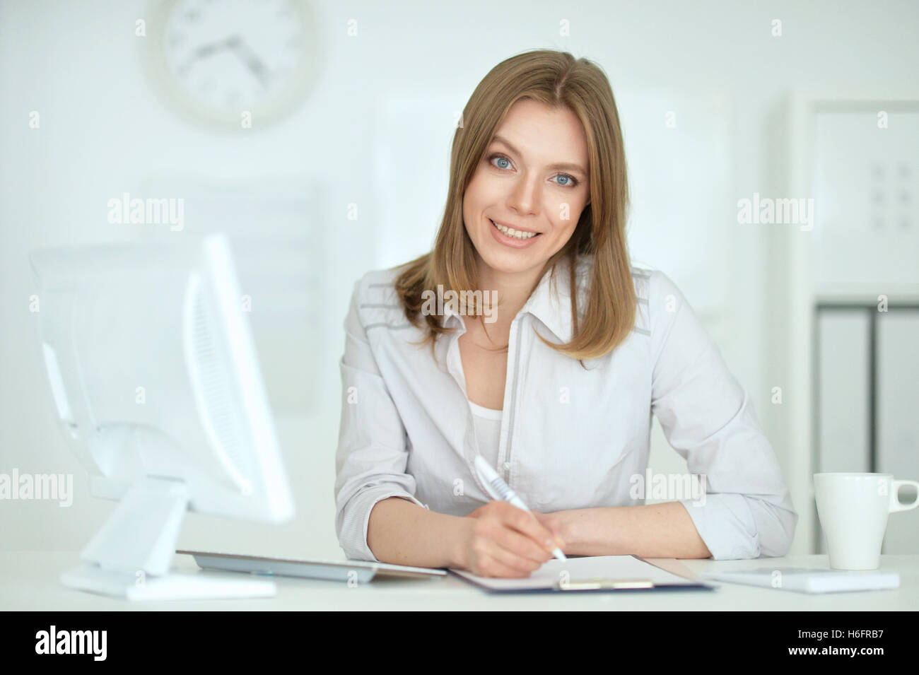 Young woman with computer Stock Photo - Alamy