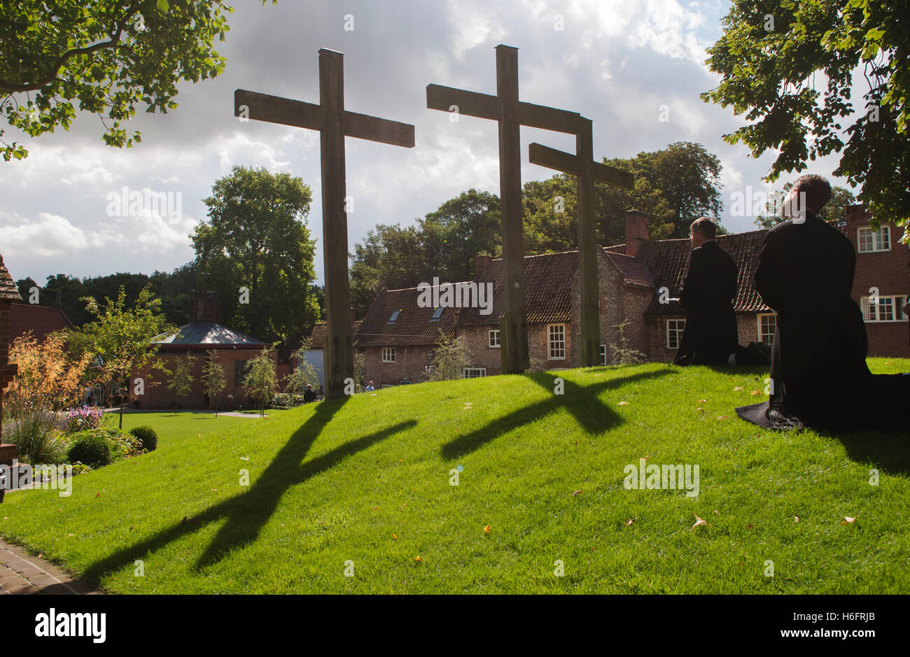 Anglican priests praying In the grounds of The Holy House Englands ...