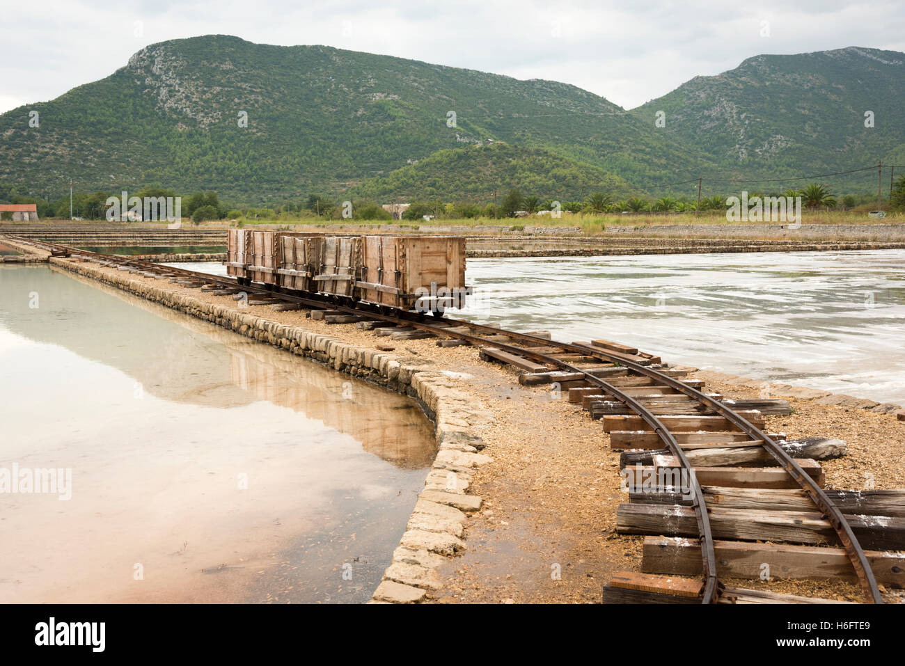 The railway line and tracks with wooden carts used to transport salt at ...