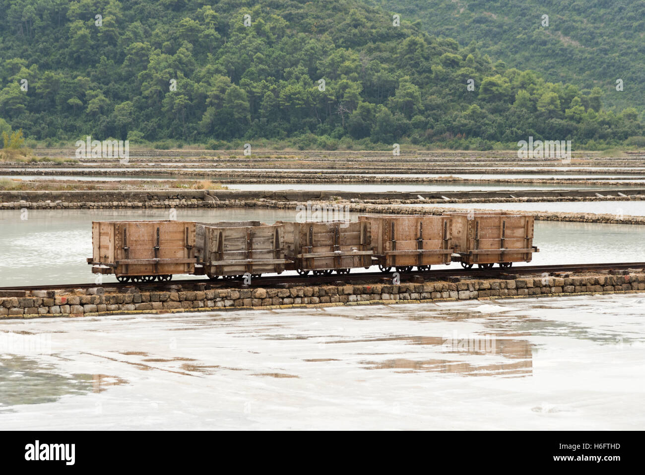 The railway line and tracks with wooden carts used to transport salt at ...