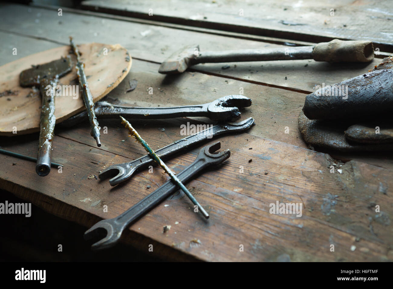 old tools with wrench in grease Stock Photo - Alamy