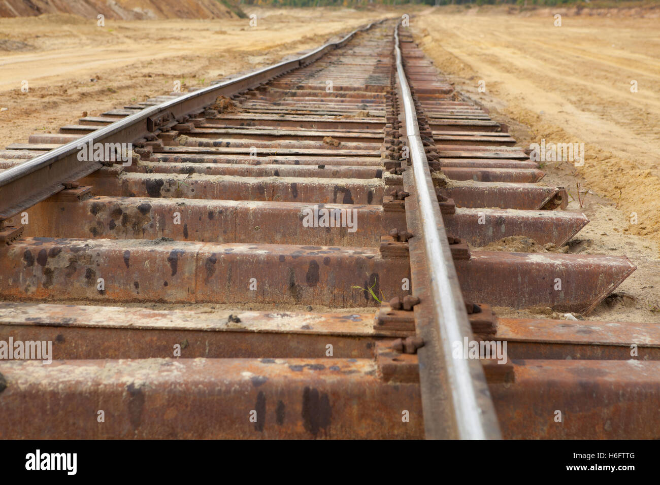 perspective of old rusty railway Stock Photo - Alamy
