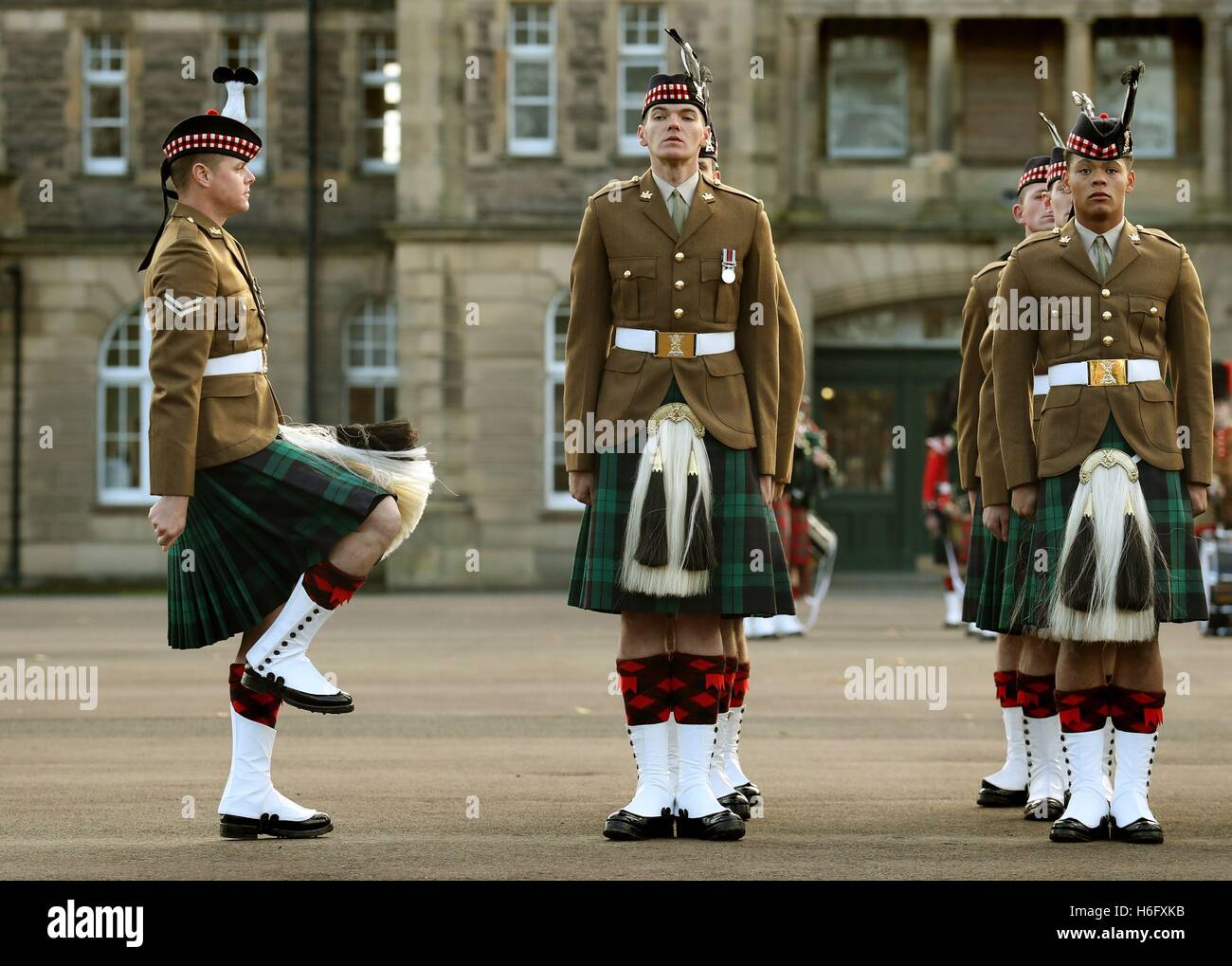Corporal Warren Grant (left) from The Royal Regiment of Scotland, with ...