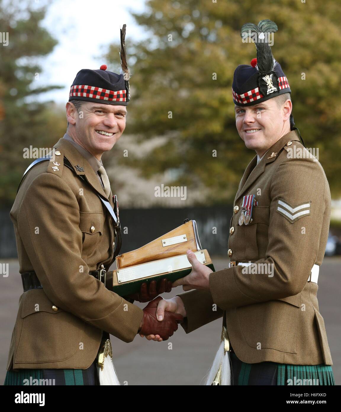 Corporal Warren Grant (right) from The Royal Regiment of Scotland, is ...
