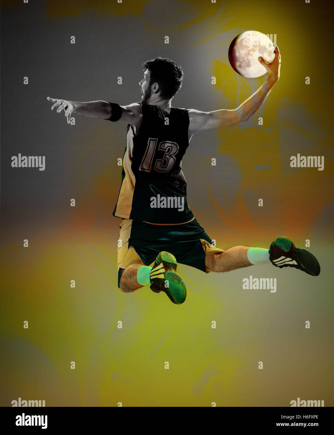Full length portrait of a basketball player with ball Stock Photo - Alamy