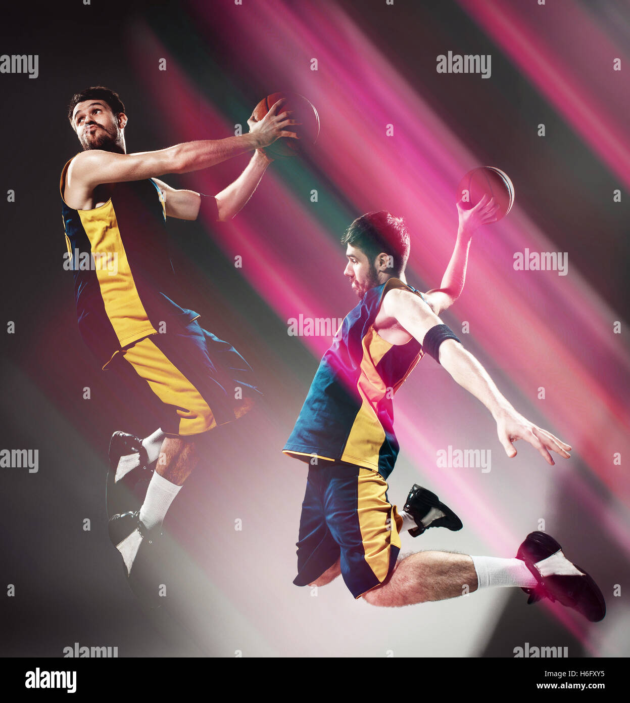 Full length portrait of a basketball player with ball Stock Photo - Alamy